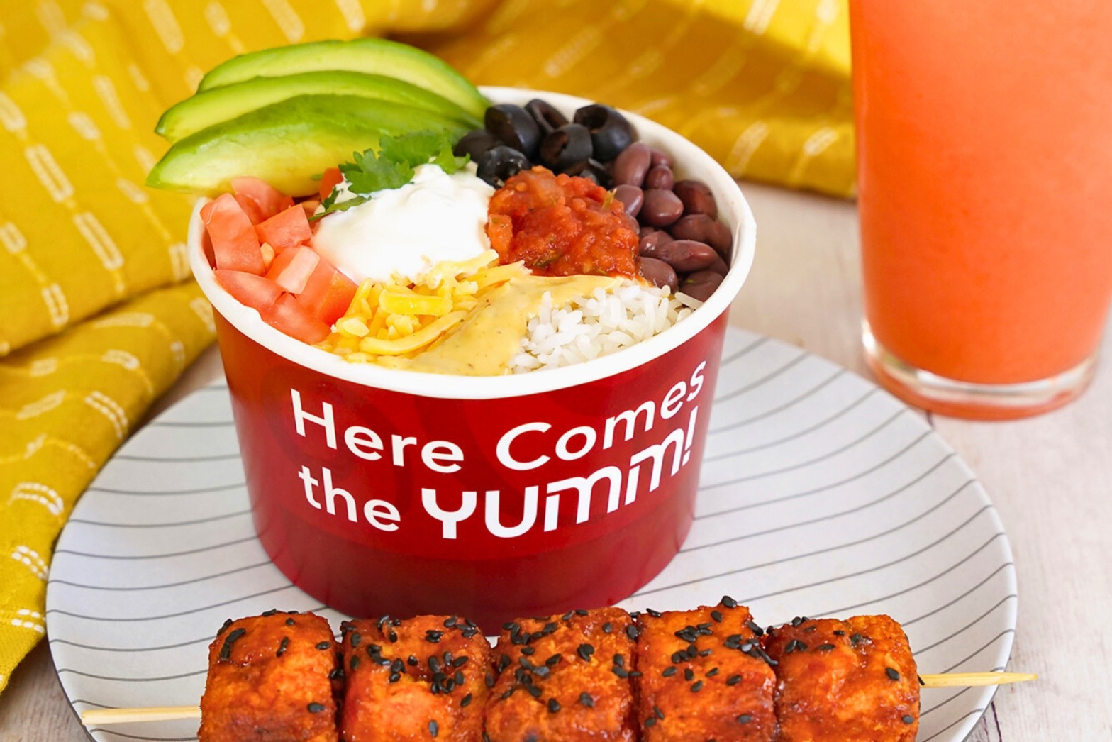 Café Yumm! serves unique bowls with famous Yumm! Sauce®.